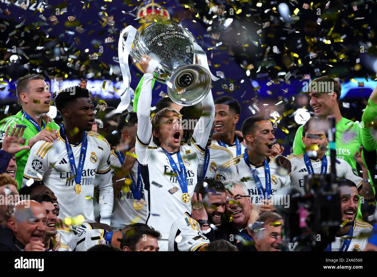 Luka Modric of Real Madrid CF lifts the trophy as he celebrates with ...