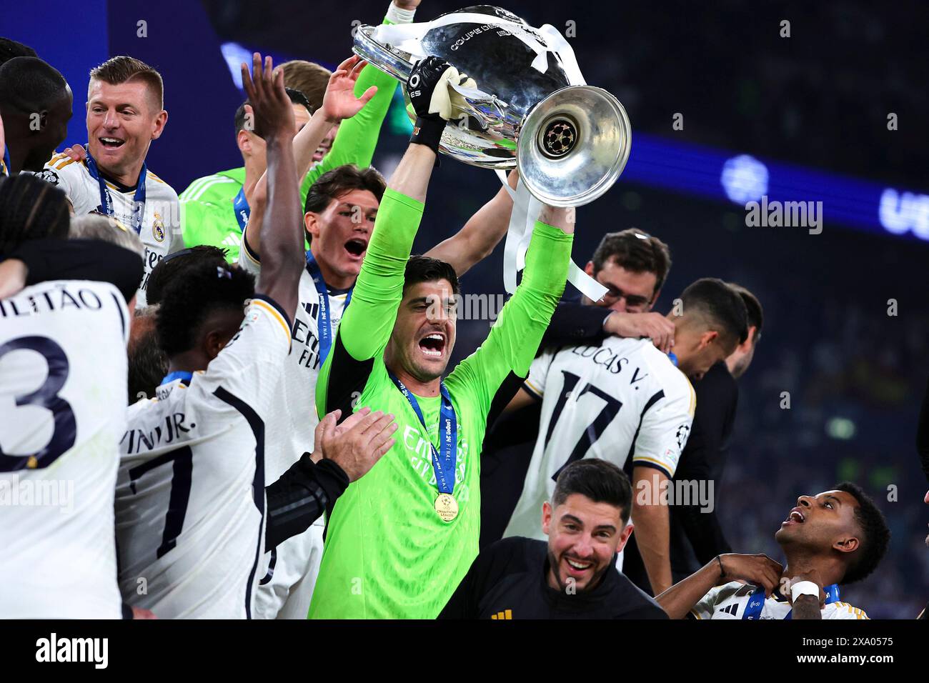 Thibaut Courtois of Real Madrid CF lifts the trophy as he celebrates ...