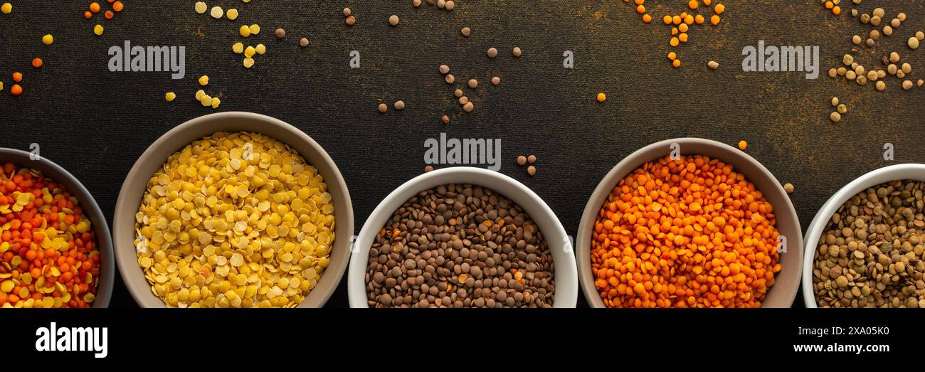 Multi-colored lentils in bowls banner, scattered yellow and brown ...