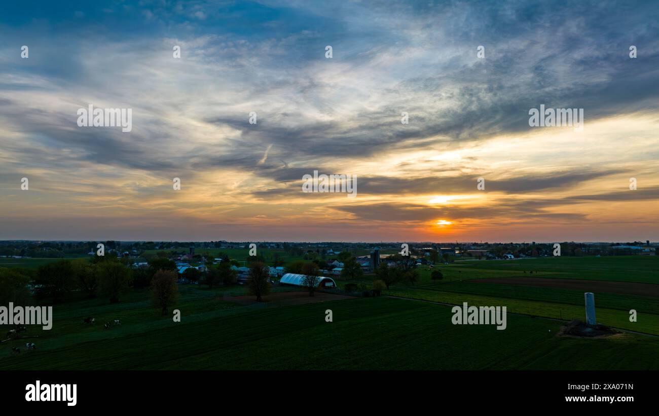 Field blue sky with glowing clouds above open space hi-res stock ...