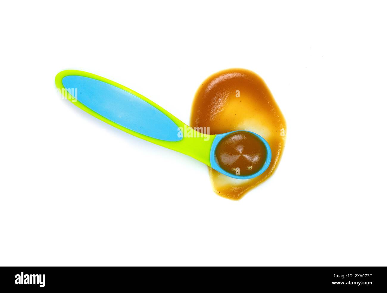 spoon with baby puree on white background Stock Photo - Alamy