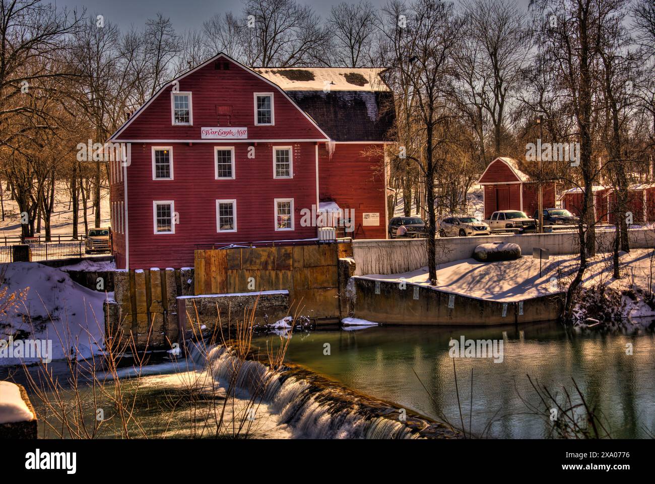A river flowing alongside buildings Stock Photo - Alamy