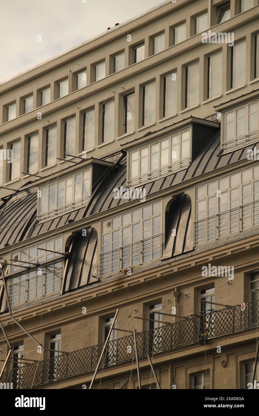 A cluster of tall skyscrapers with numerous windows in London Stock ...