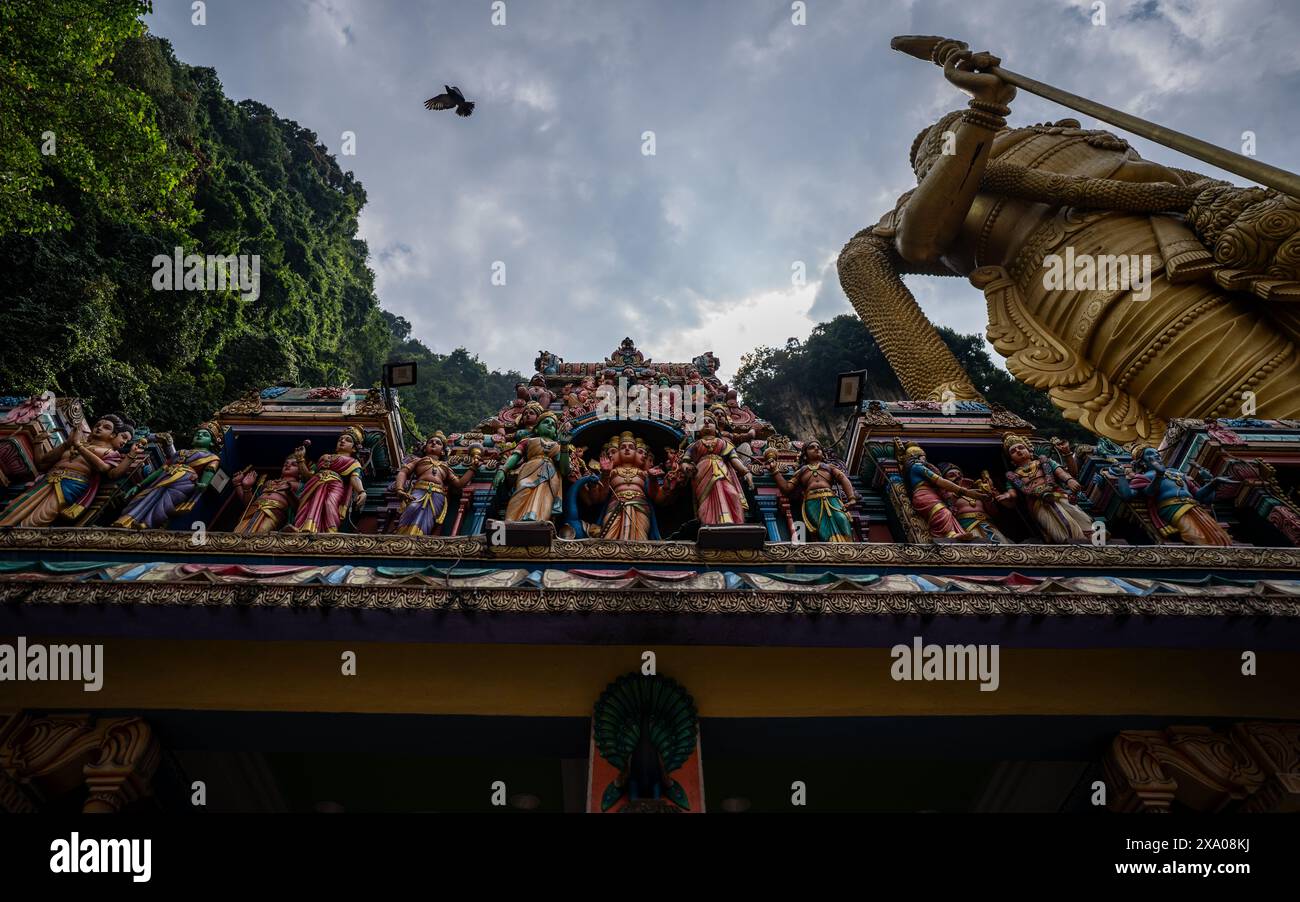 Some statues floating outside a temple in mid-air Stock Photo - Alamy