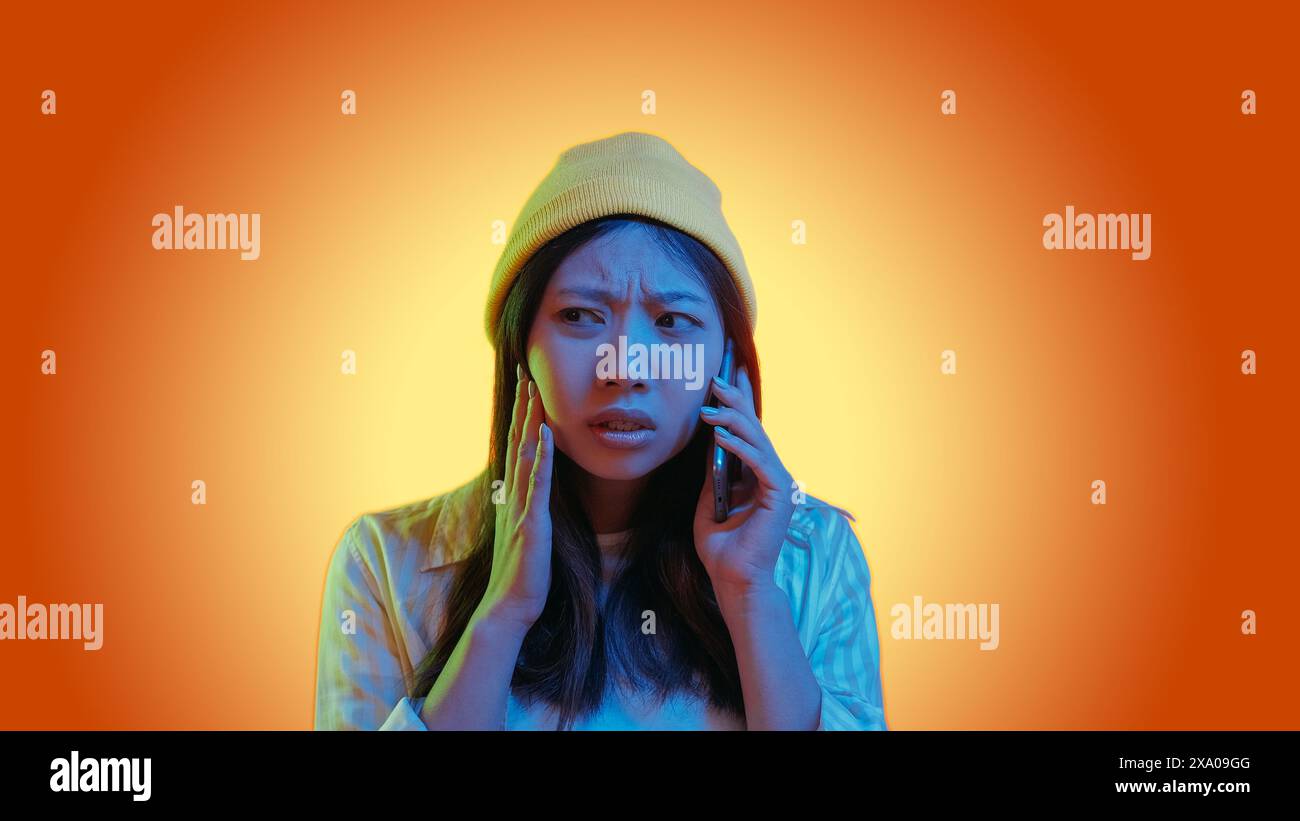 Disturbing call. Mobile scam. Blue color neon light scared confused ...