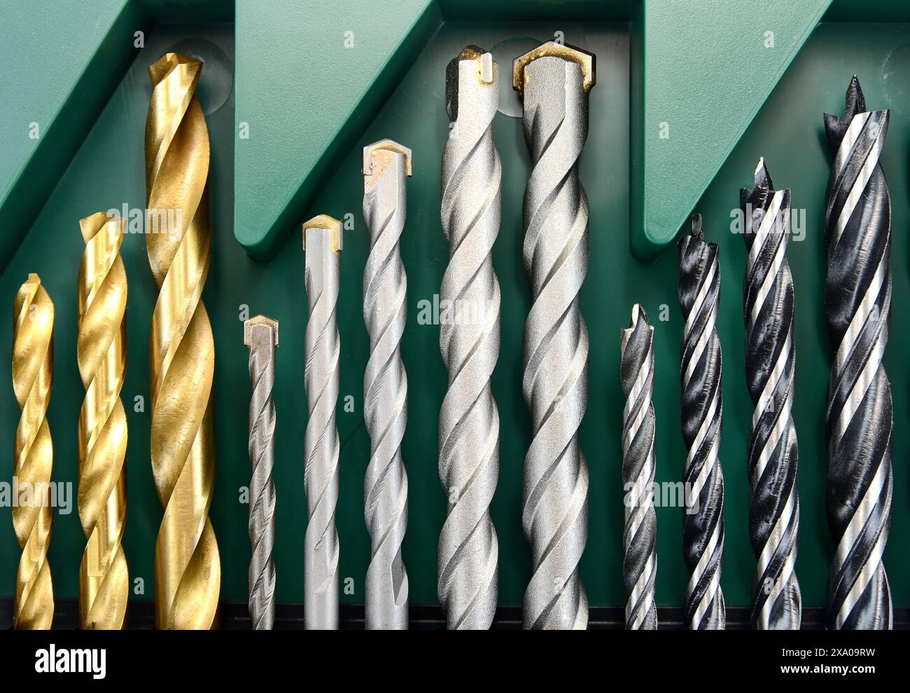 Drill bit set in box isolated on white Stock Photo - Alamy