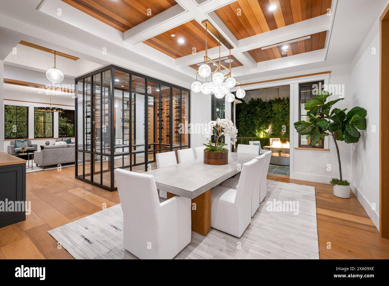 Rustic dining room and kitchen with abundant wooden floors and walls ...