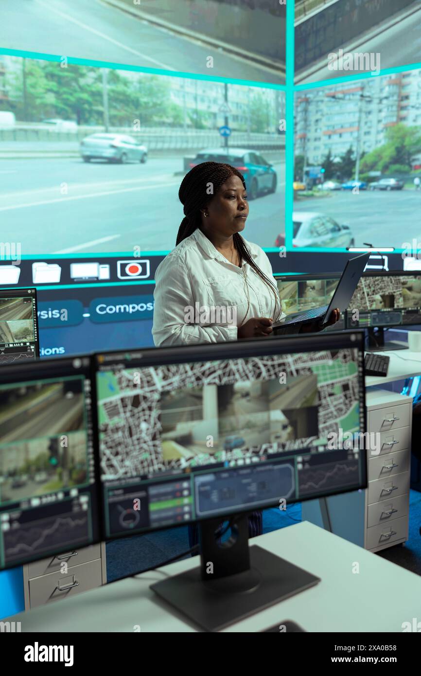African american leader reviewing traffic data collected from video ...