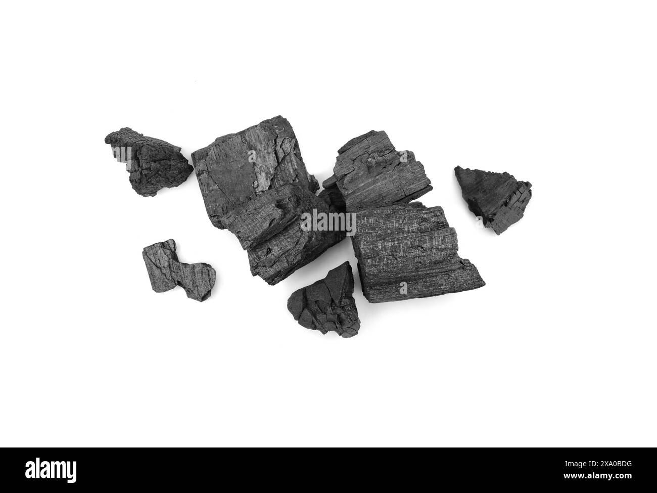 Pieces of broken black wooden coal isolated on white background Stock ...