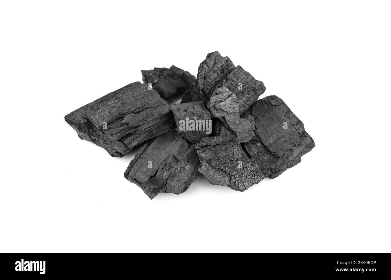 Pieces of broken black wooden coal isolated on white background Stock ...