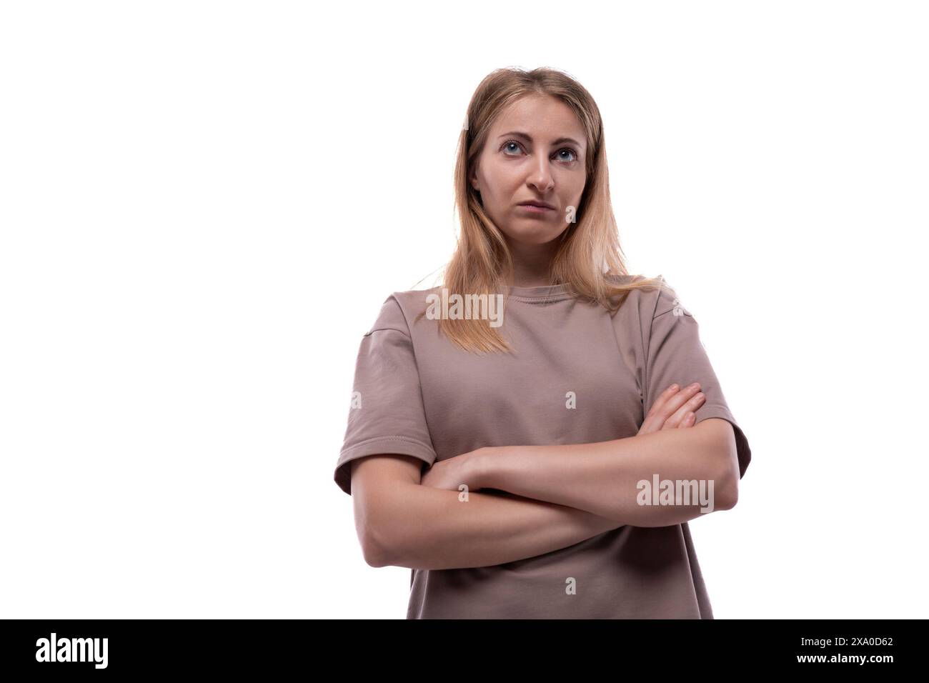 Upset sad 40 years old woman with blond hair on white background Stock ...