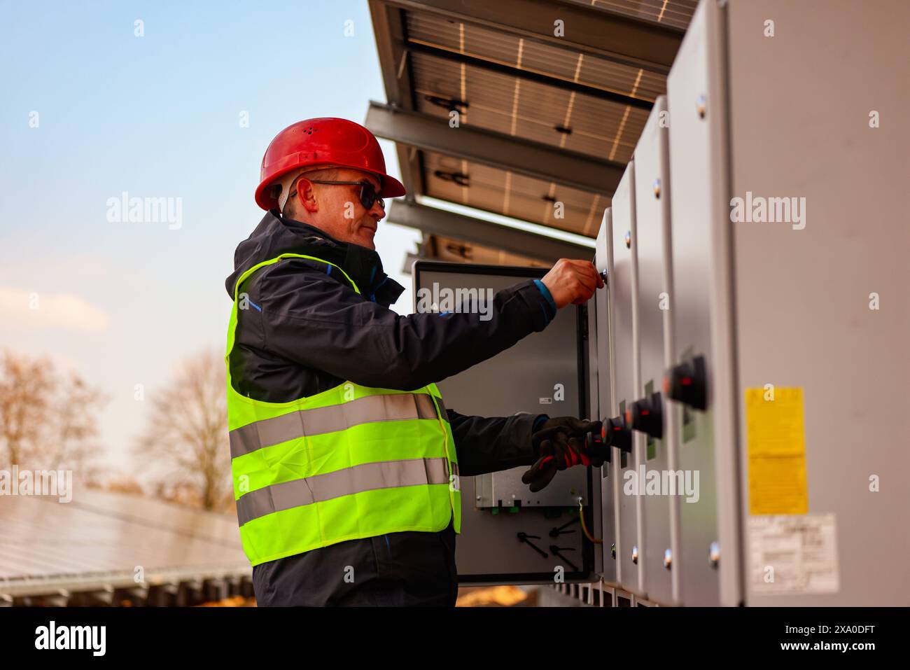 A scenic view of a man working at Solar Field Construction Site in ...