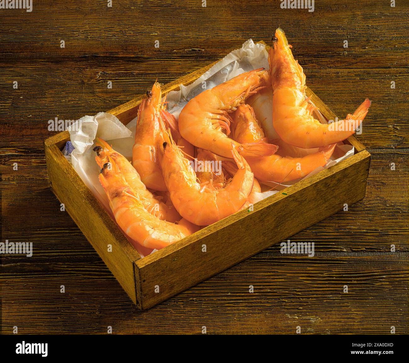 Rustic Delights: Wooden Box Overflowing with Prawns Stock Photo - Alamy
