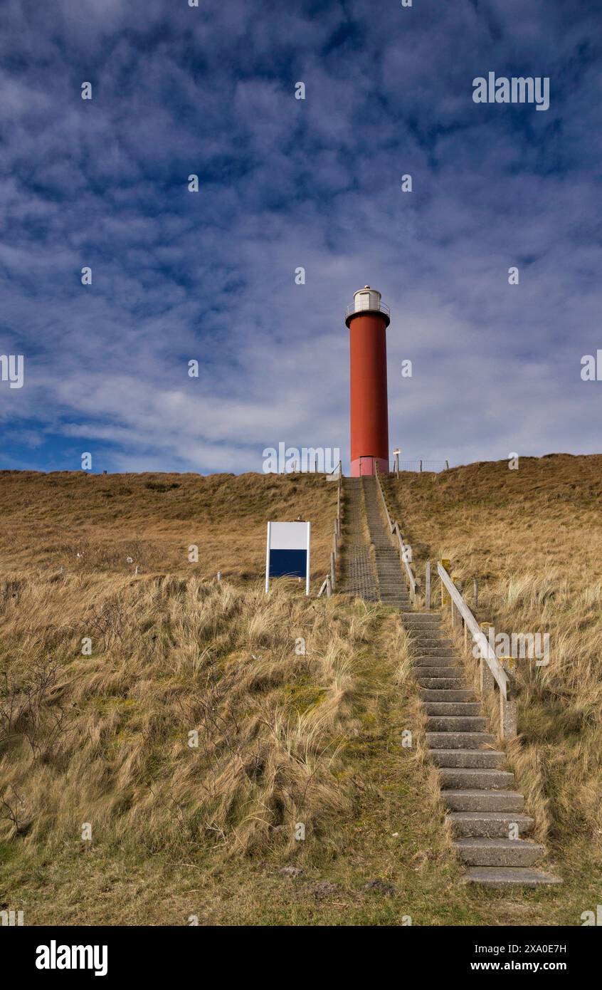 The Zanddijk-Groote Kaap is a red painted steel lighthouse in the dunes ...