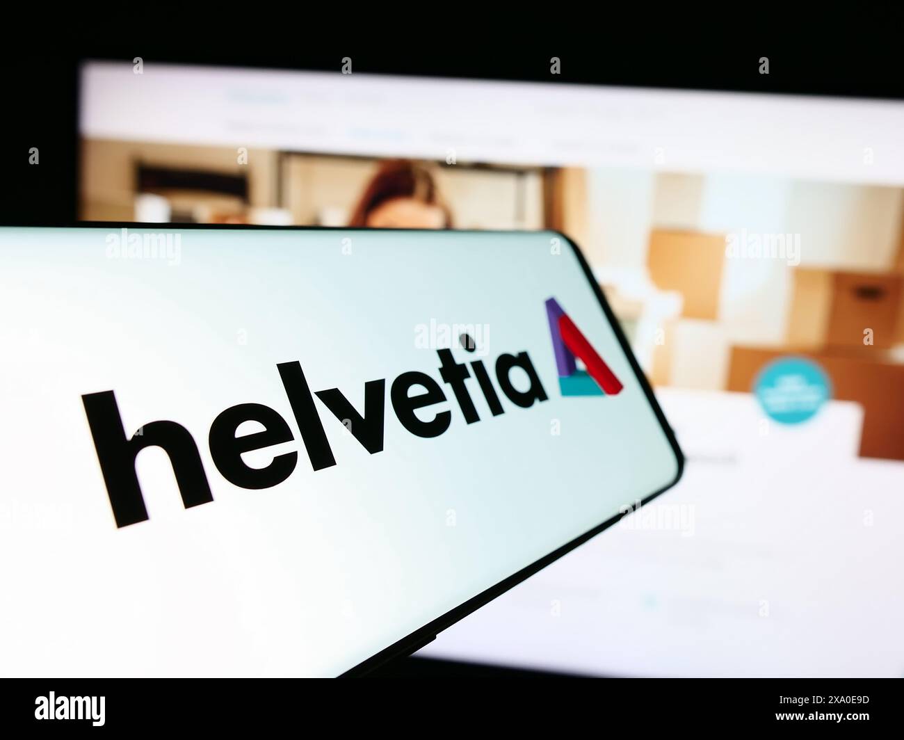 Mobile phone with logo of Swiss insurance company Helvetia Holding AG ...