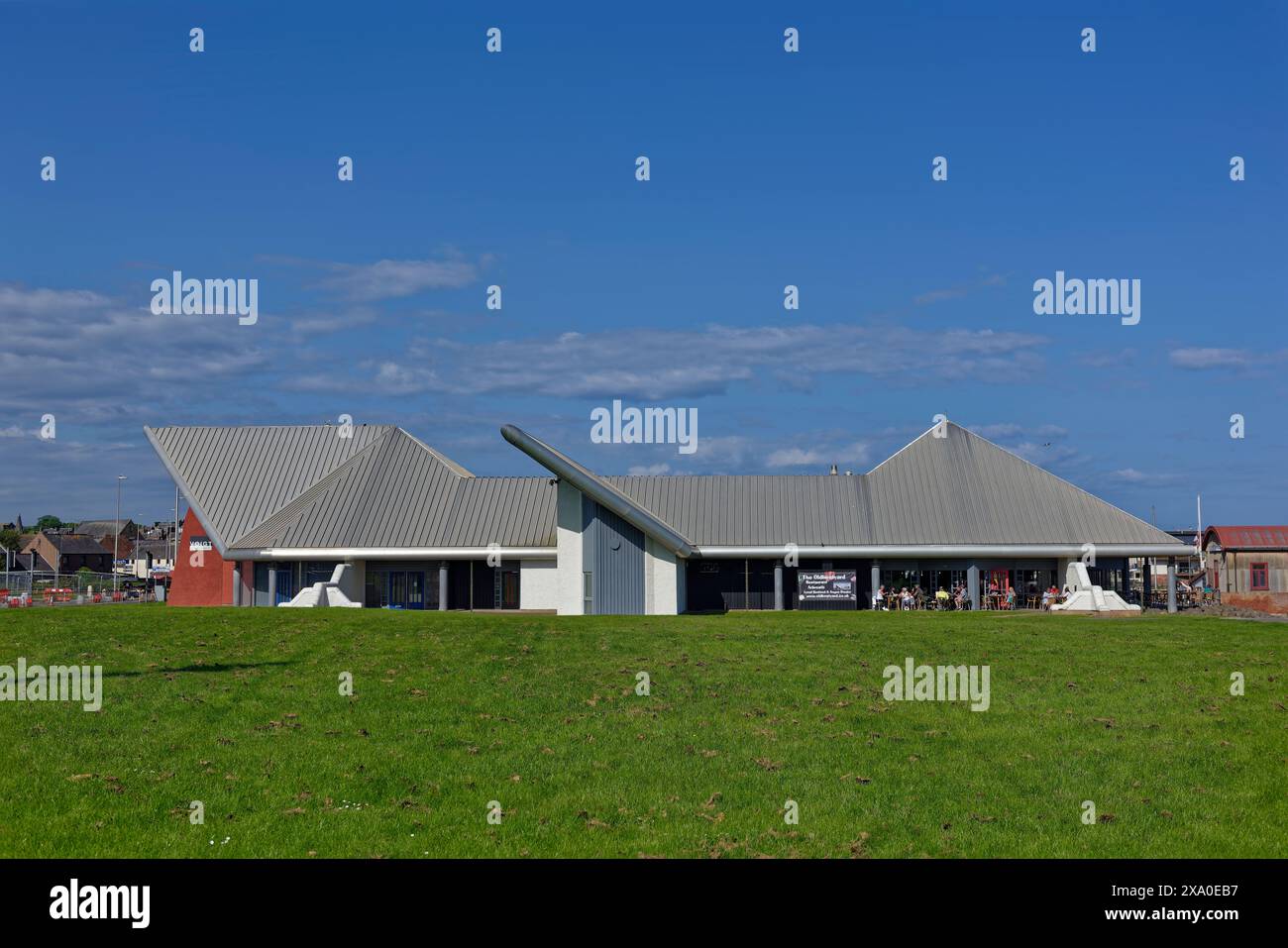 The Old Boatyard Seafood Restaurant, with Customers using the outside ...