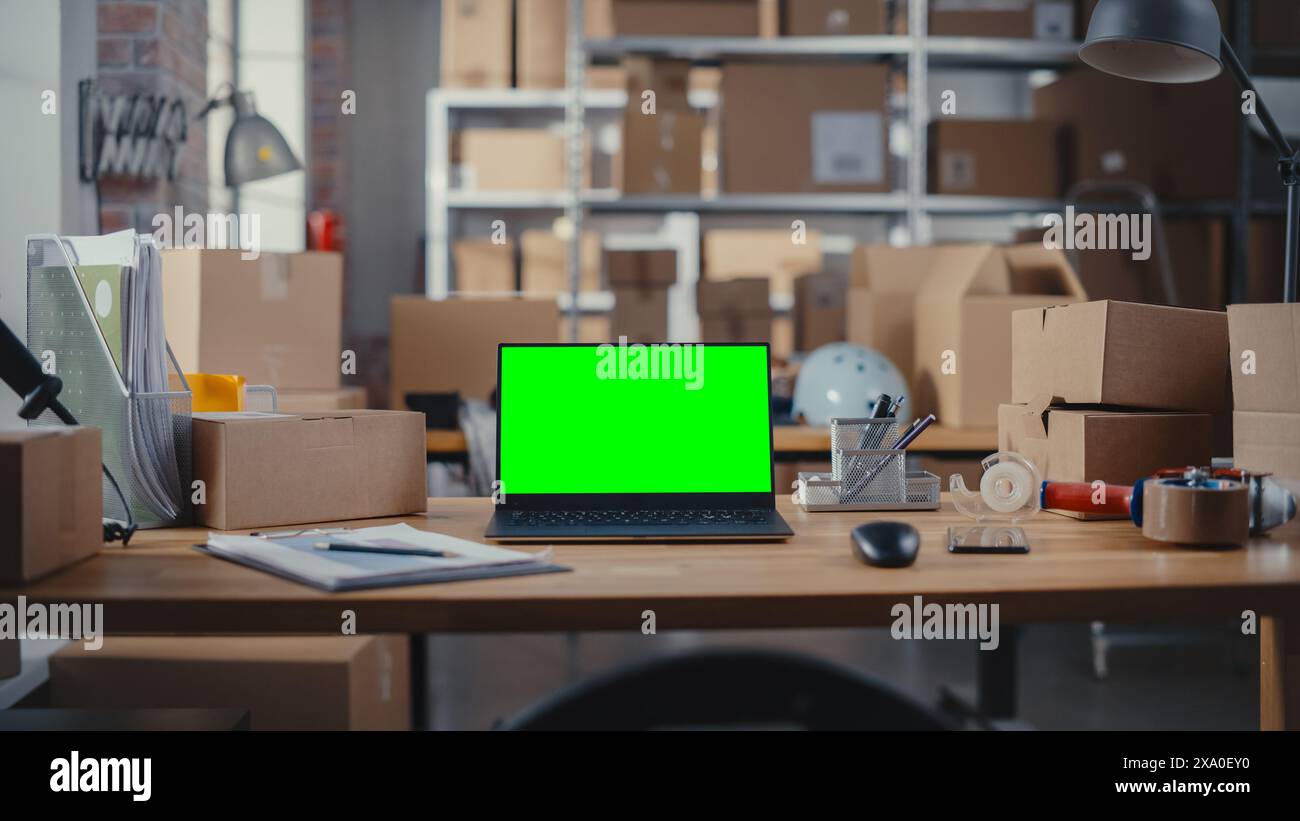 Desktop Computer Monitor Standing on a Table with a Green Screen ...