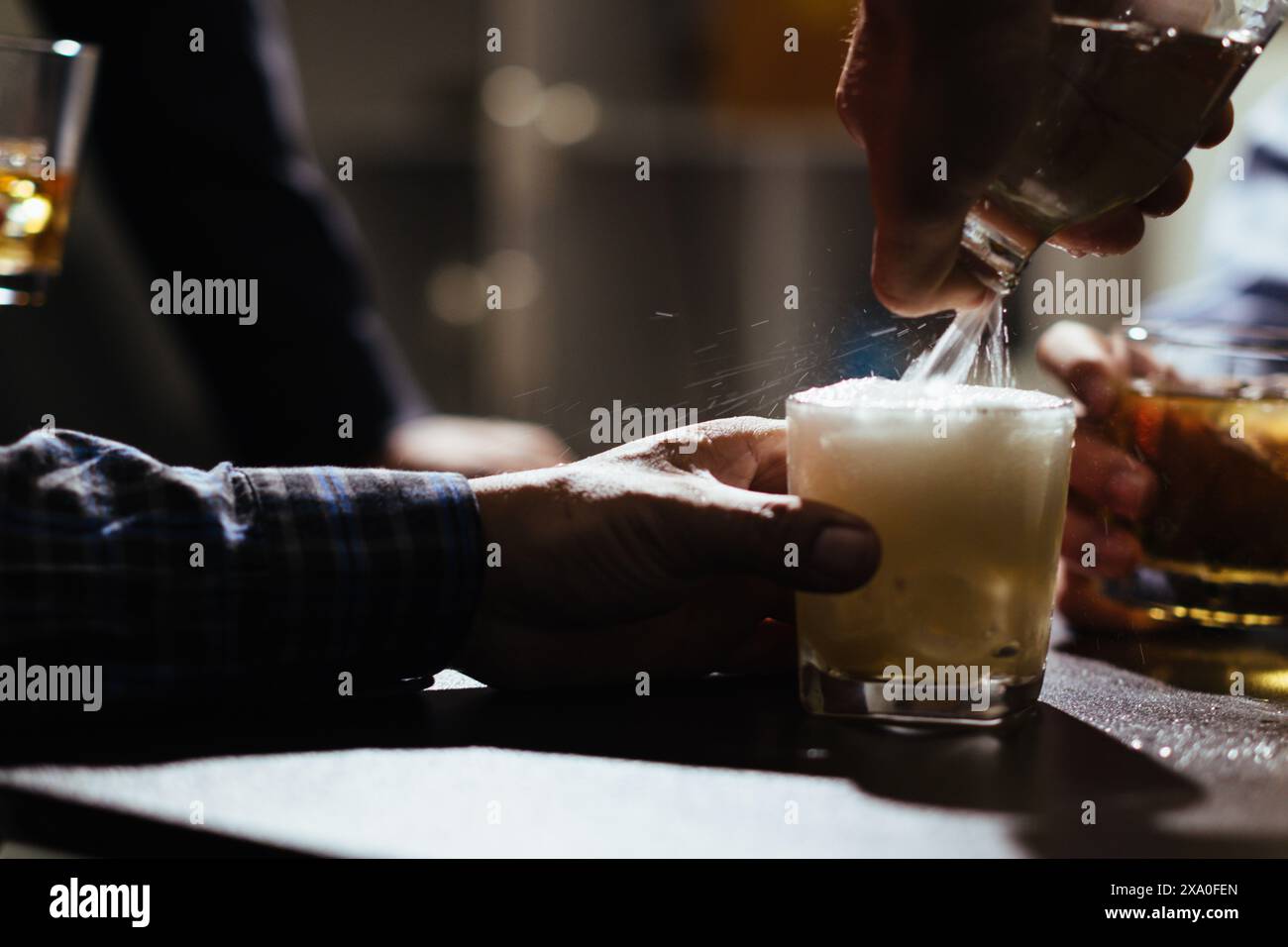 Businessmen and investors drink alcohol together in office after ...