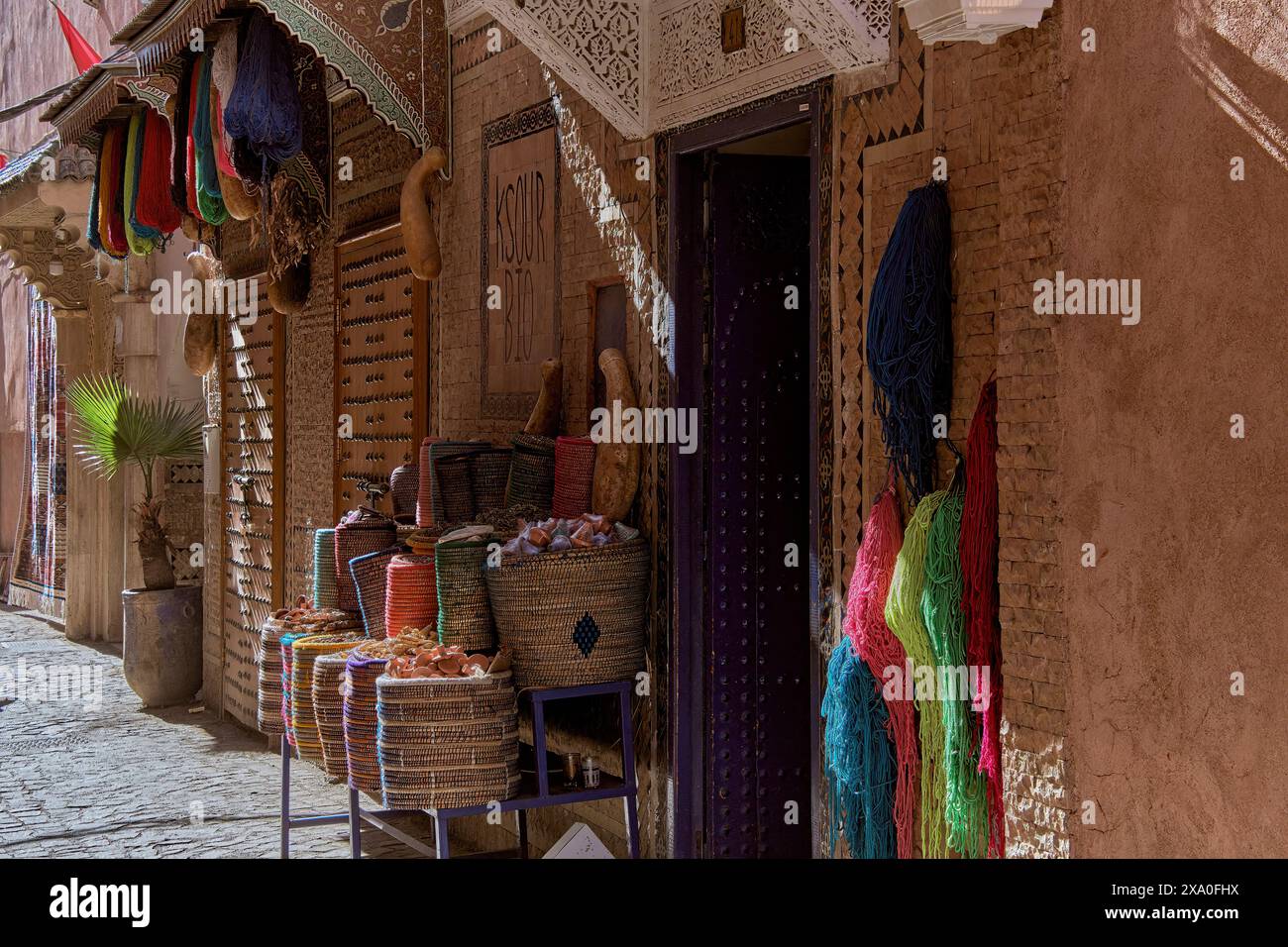A shop in Marrakech with wooden doors and nail heads of Mozarabic style ...