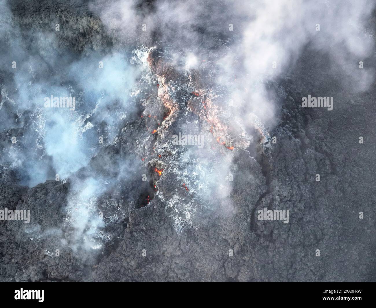 Grindavik, Iceland. 08 May, 2024. Aerial view showing steam and gasses ...