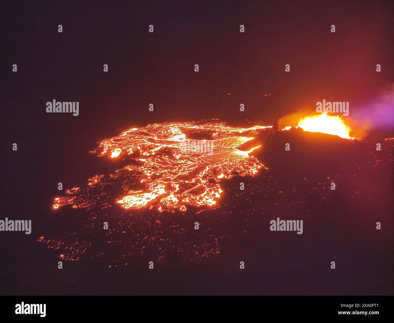 Grindavik, Iceland. 07 April, 2024. Lava spews from magma vents and the ...