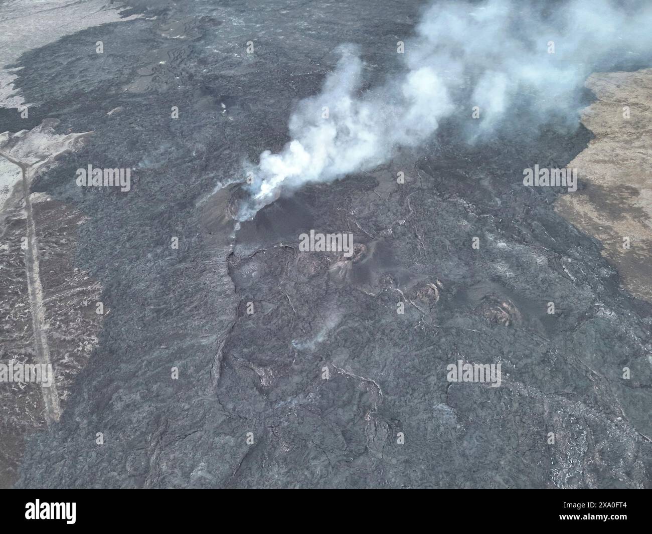 Grindavik, Iceland. 08 May, 2024. Aerial view showing hardened magma ...