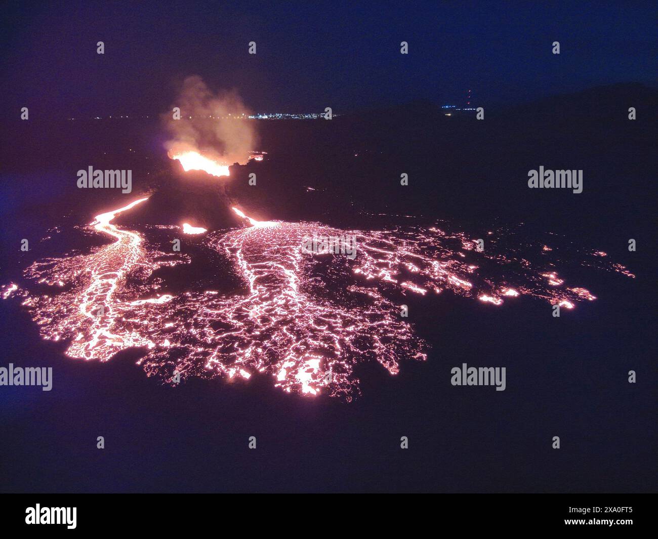 Grindavik, Iceland. 07 April, 2024. Lava spews from magma vents and the ...