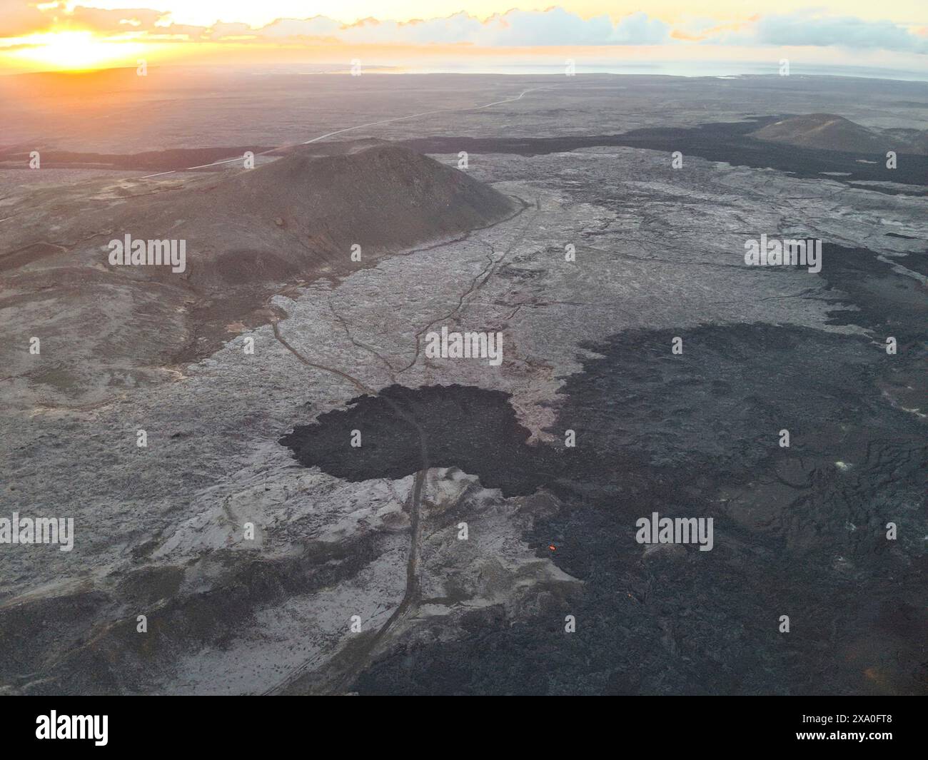 Grindavik, Iceland. 08 May, 2024. Aerial view showing hardened magma ...