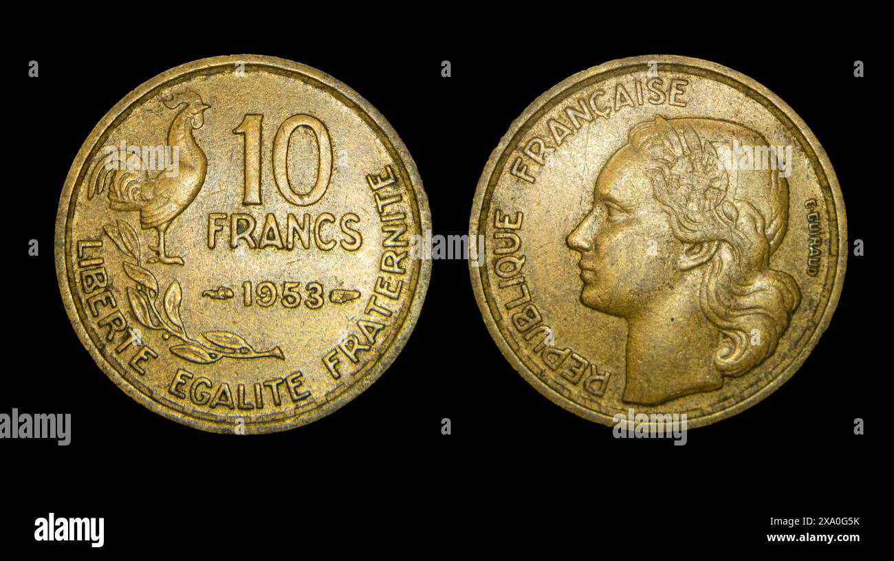 A close-up of 10 French francs coin 1953 on a black background Stock ...