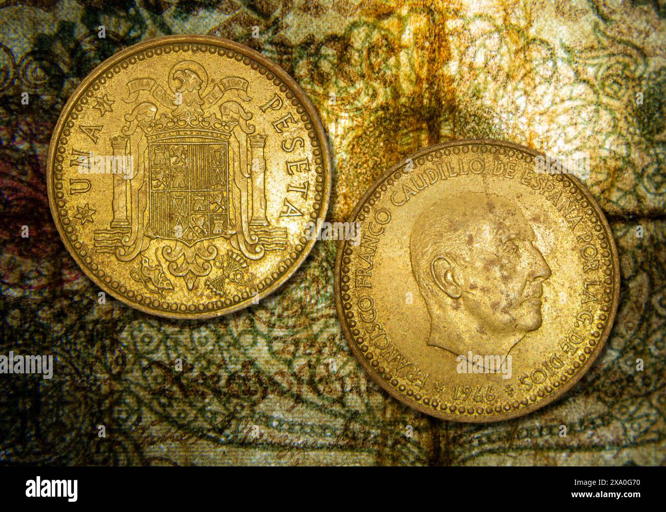 A Spanish peseta coin with Francisco Franco on a gold background Stock ...