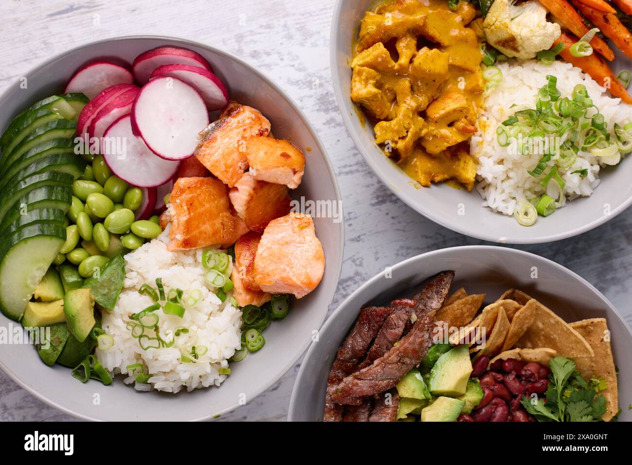 Four bowls displaying a variety of food Stock Photo - Alamy
