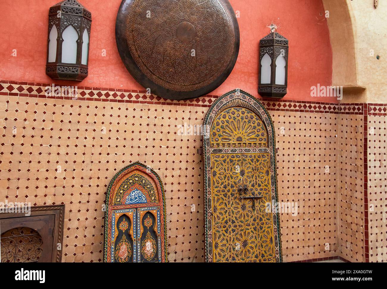 Wooden doors with locks and knockers decorated with wrought iron made ...