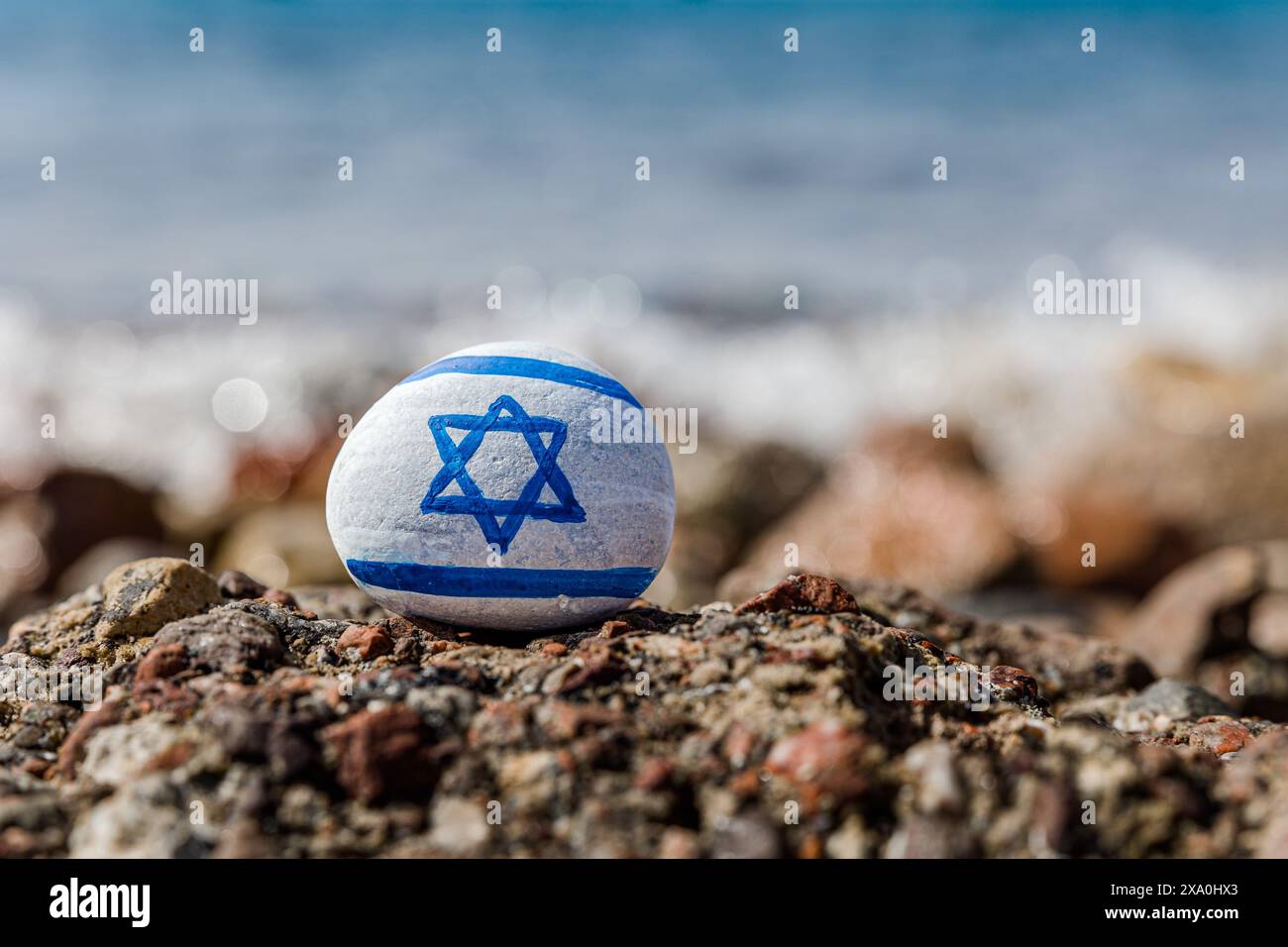 Israeli flag painted rock. Hand painted stone with Magen David. Blue ...