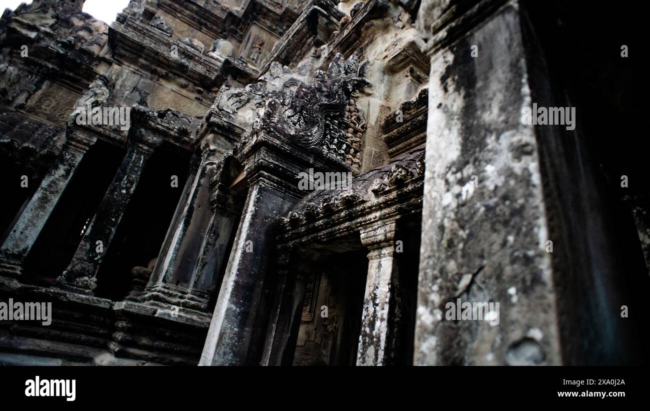 Ancient stone column and pillars of historic building adorned with ...
