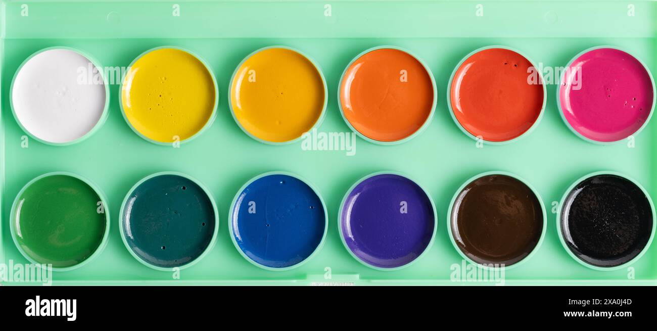 Background of twelve colors of watercolor paints Stock Photo - Alamy