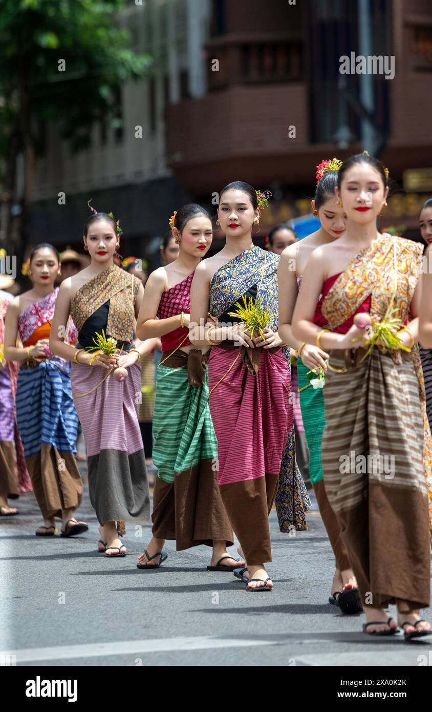 Thai performers wearing traditional costumes seen during The Phra ...