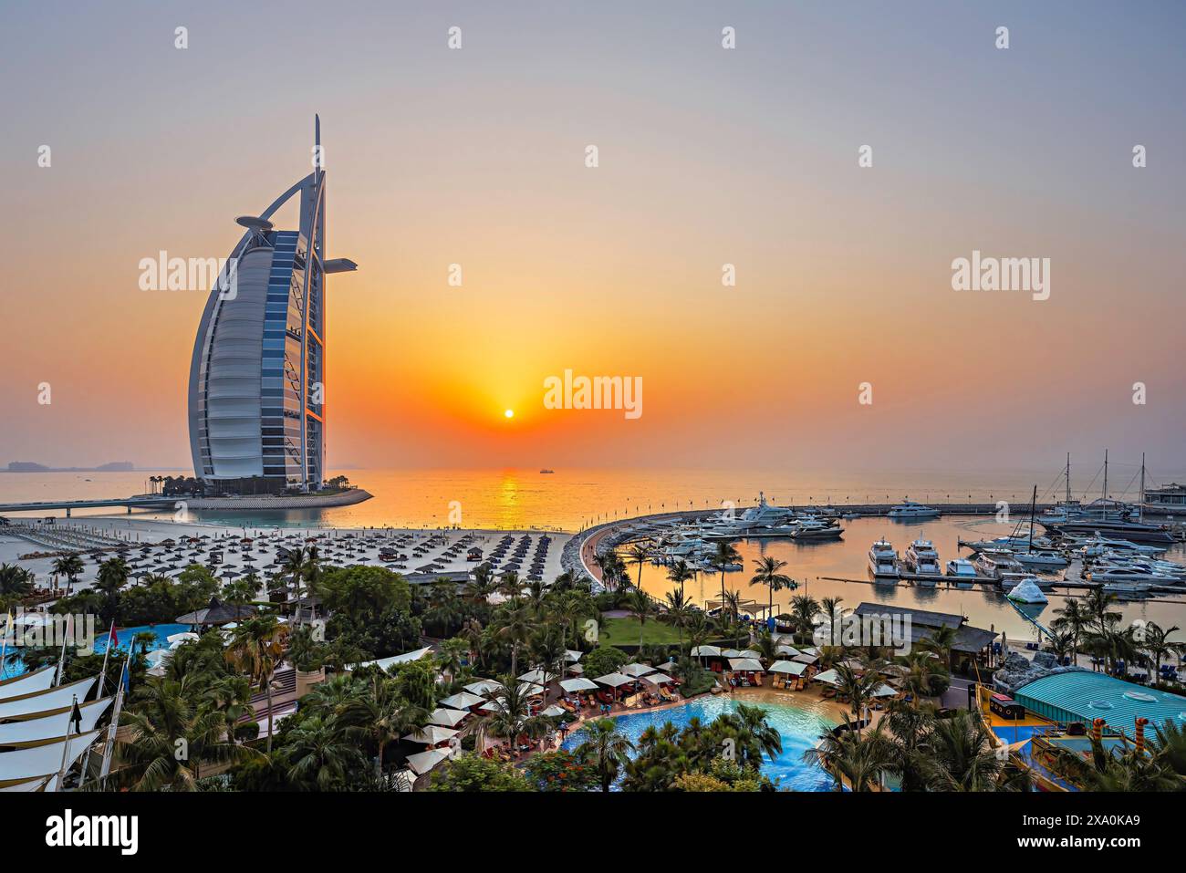A scenic view of Burj Al Arab Jumeirah at sunset in Dubai, UAE Stock ...