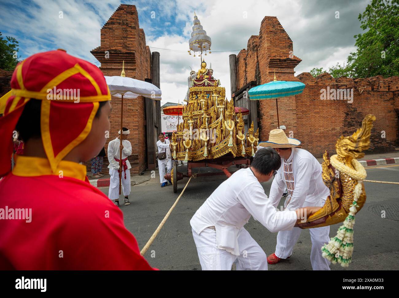 Thai people wearing traditional costumes seen during The Phra Buddha ...