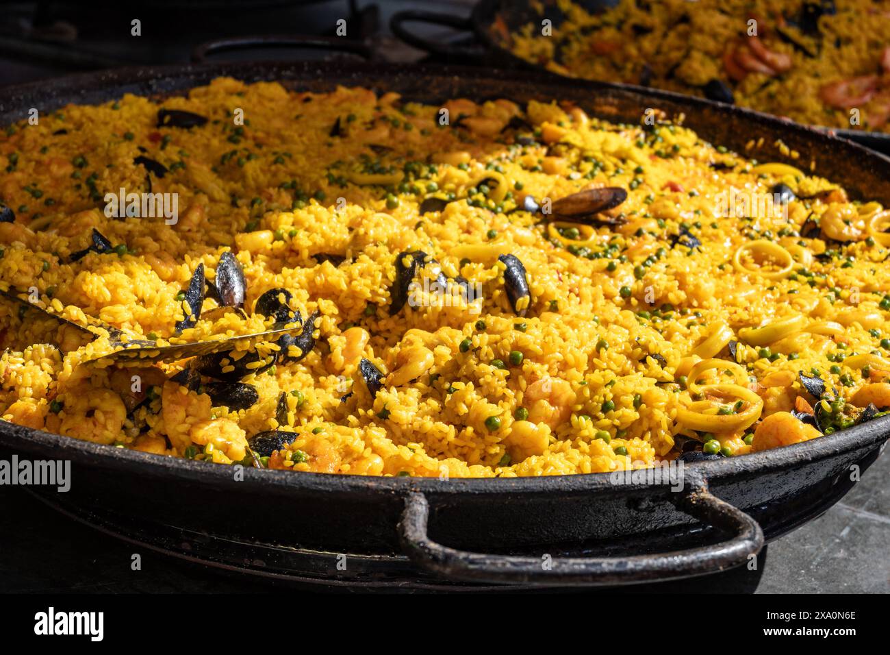 Street food in London, food court on Portobello road Saturday market, fresh prepared colorful ...