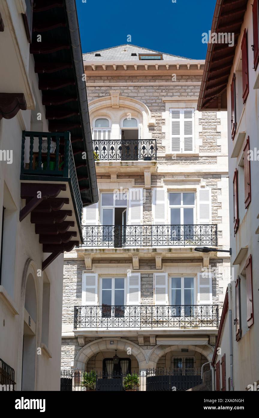 Houses and streets of touristic Biarritz city in sunny day, Basque ...