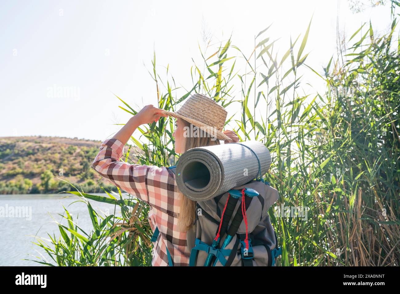 portrait of a backpacking woman Stock Photo - Alamy