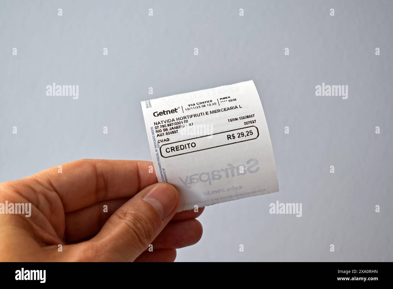 RIO DE JANEIRO, BRAZIL - NOVEMBER 10, 2023: Supermarket receipt on hand ...