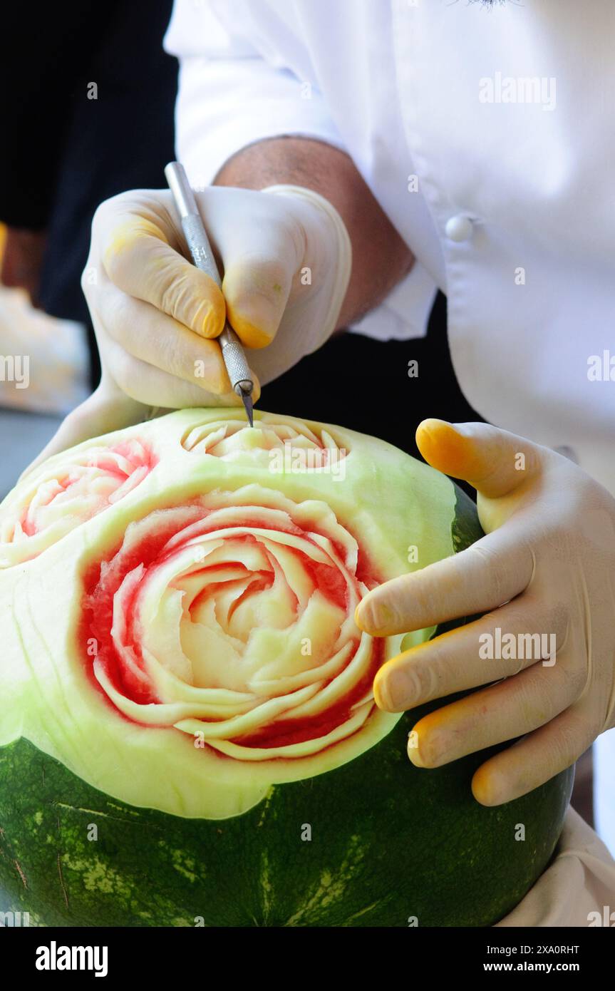 Chef Carving Watermelon Stock Photo - Alamy