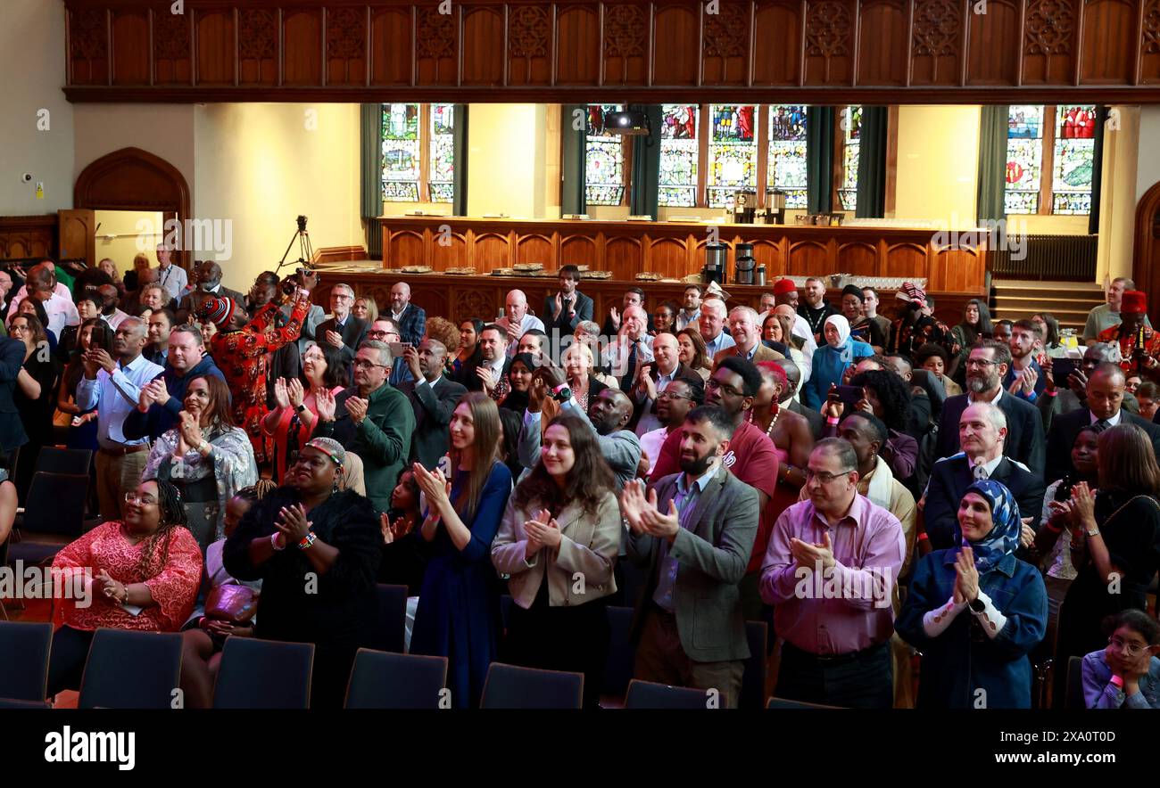 Supporters stand and applaud as Councillor Lilian Seenoi-Barr (not ...