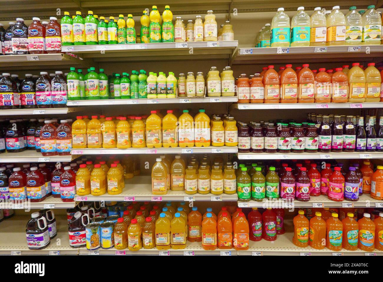Fruit juice display shelves in supermarket grocery store Stock Photo ...