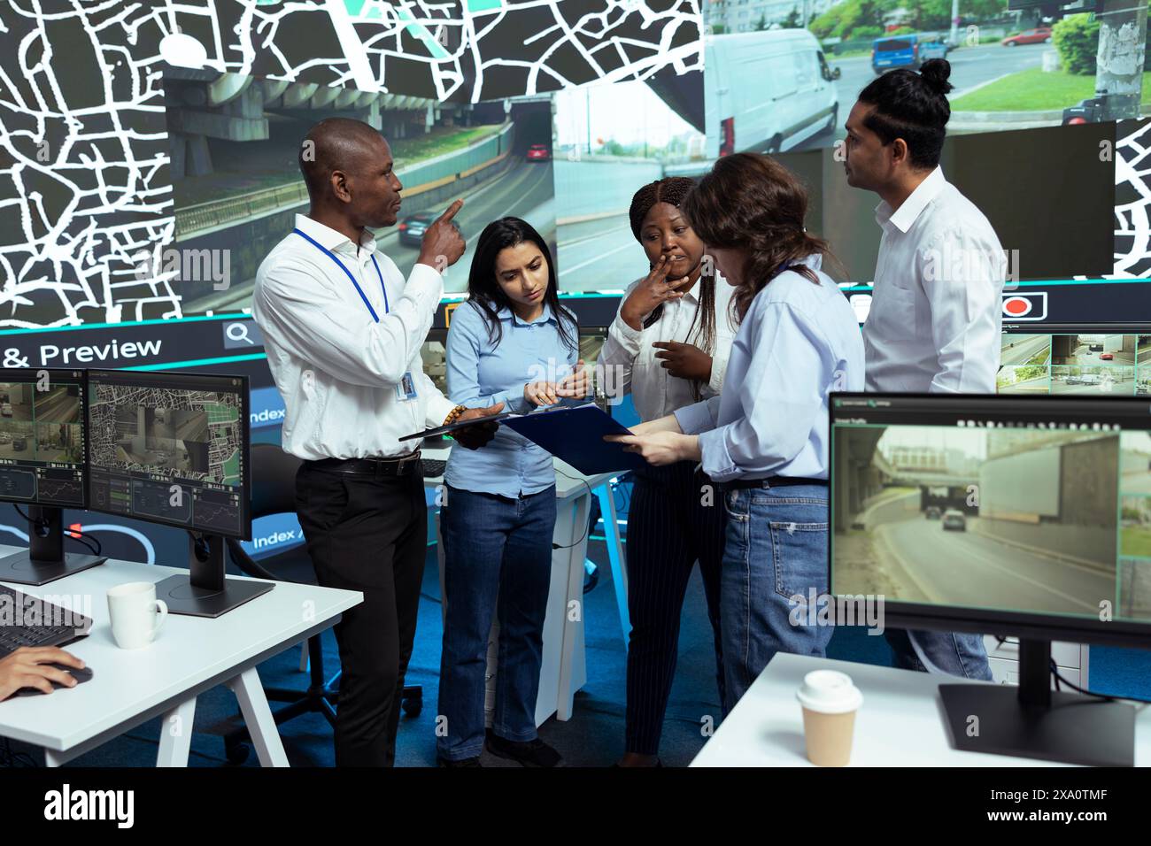 Diverse group of operators discussing ways to improve express shipping ...