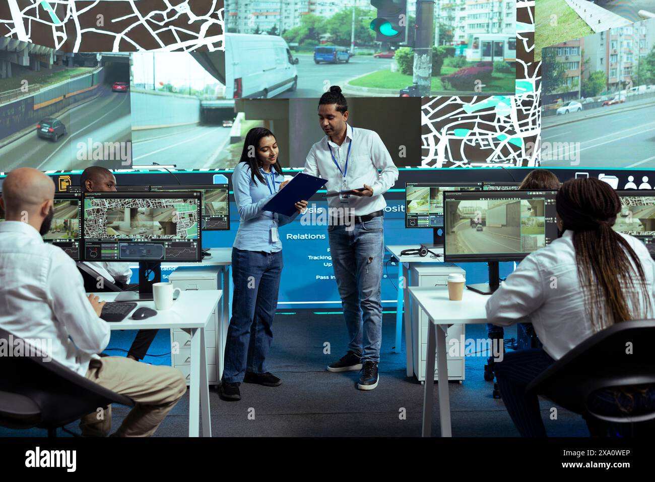 Indian team of operators instructing their colleagues to use CCTV ...