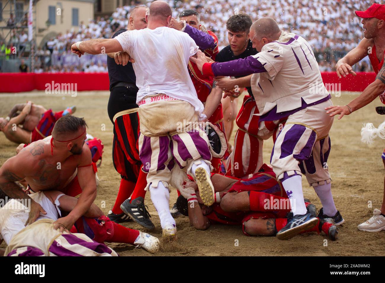 Players clash during the semifinal between Whites (Santo Spirito) and ...