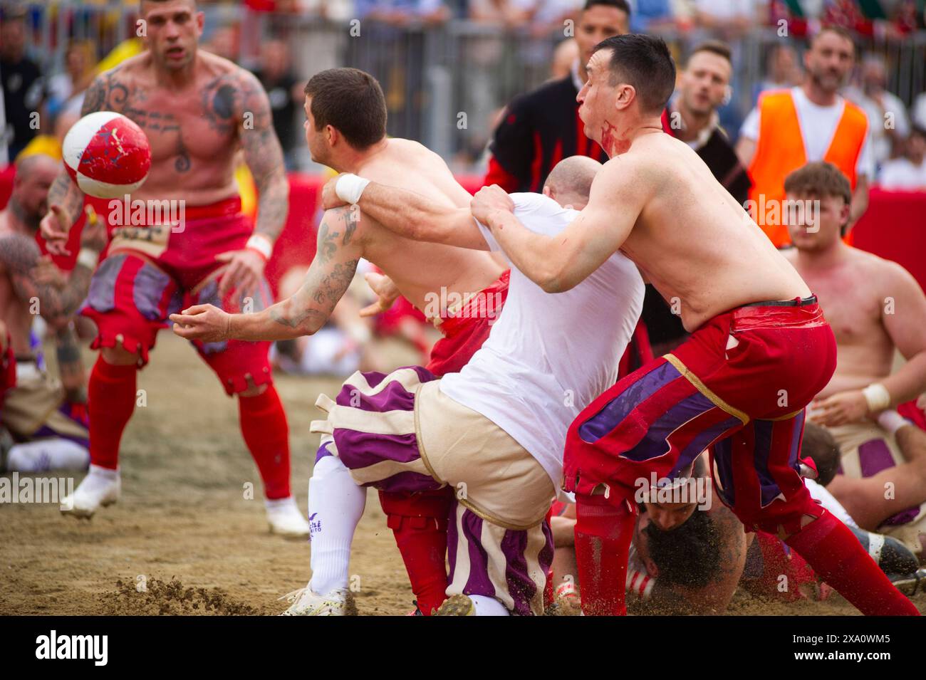 Players clash during the semifinal between Whites (Santo Spirito) and ...