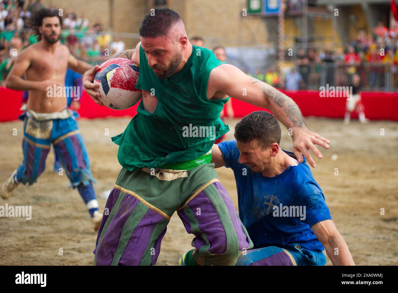 Players clash during the semifinal between Blues (Santa Croce) and ...